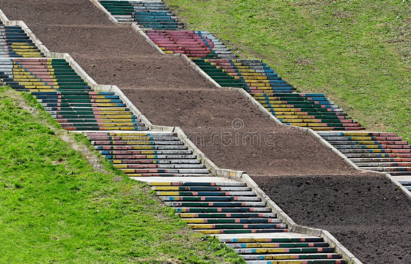 Painted Steps of Old Stairway on a Grassy Slope in a Park Stock Photo ...