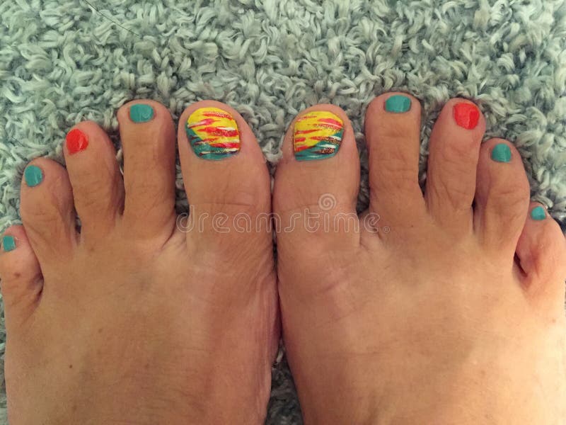 Painted toes in the sand stock image. Image of covered - 55484865