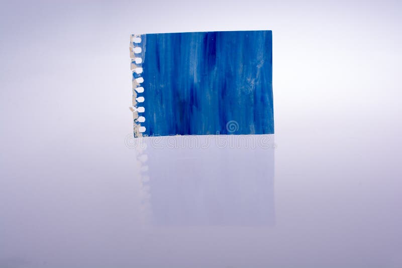 Torn Note Paper Painted in Blue Stock Photo - Image of paper, office ...