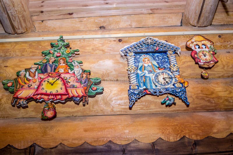 Painted Wooden Wall Clock on Log Wall Stock Photo - Image of paint ...