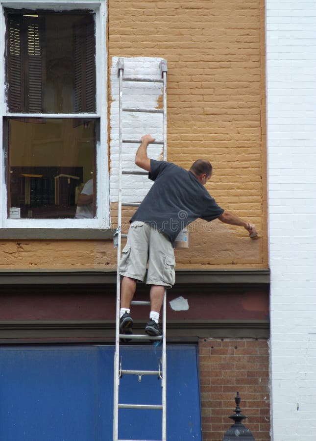Painter stock photo. Image of building, climb, gold, renovate - 269406