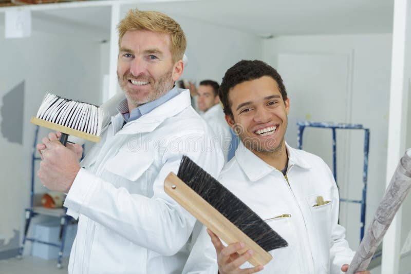 Painter with Apprentice Painter Painting Climbed Up Ladder Stock Photo ...