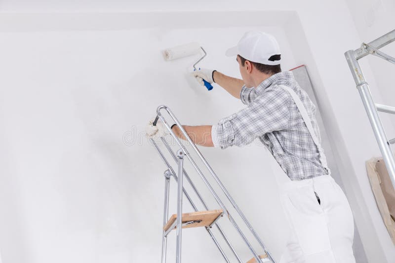 Painter or Builder Painting a White Wall Stock Image - Image of roller ...