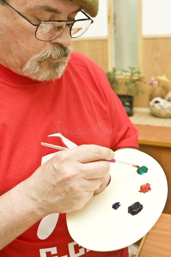 Painter with color pallet stock image. Image of watercolors - 5451265