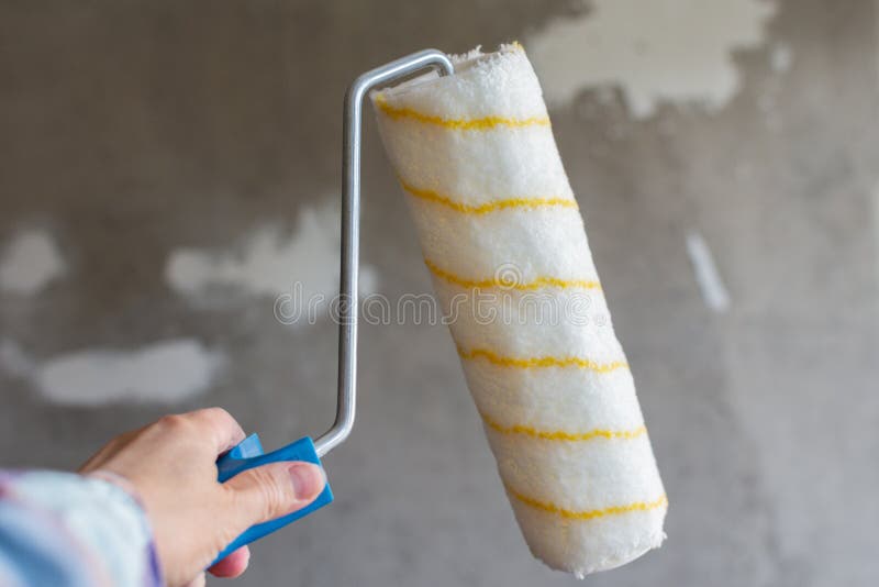 Painter Hand with a Paint Roller Stock Photo - Image of improvement ...