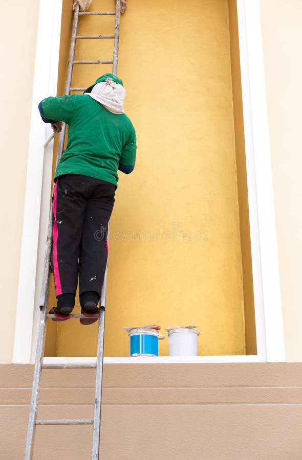 Painter on a Ladder Painting the Wall Stock Photo - Image of paintbrush ...