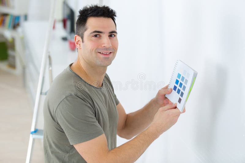 Painter Man Chooses from Various Color Samples Stock Image - Image of ...
