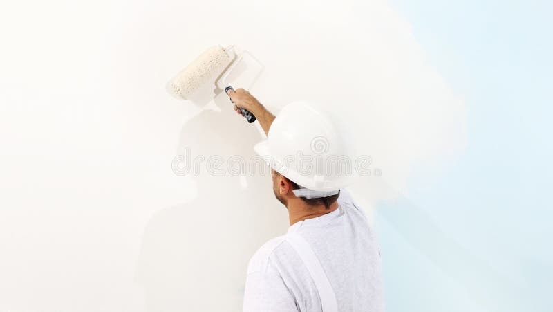 Painter Man at Work with a Paint Roller, Wall Painting Stock Photo ...