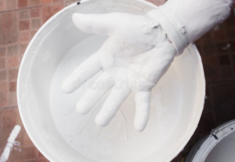 Painter Mixing White, Color Dripping Down Hand with Colors Mix Stock ...