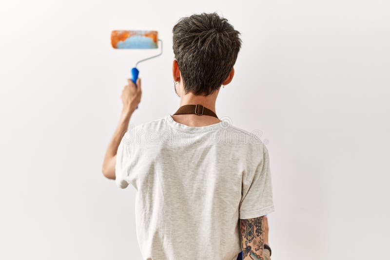 Painter Painting Wall Using Roller at Home Stock Image - Image of ...
