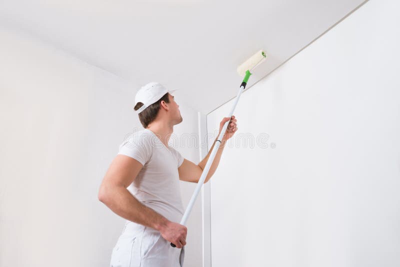 House painter at work stock image. Image of building - 30298427