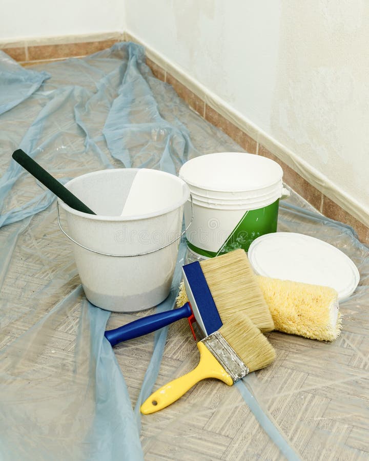 Painter Paints the Wall with the Tint of White. Stock Photo - Image of ...