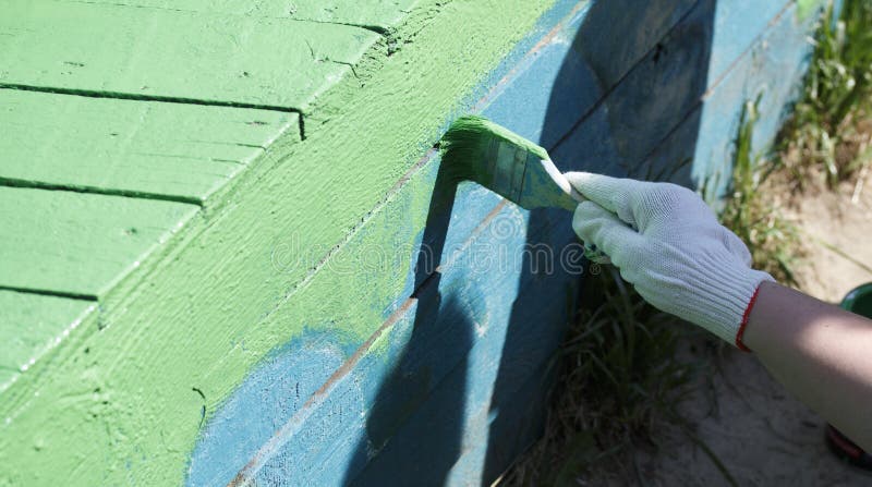 The Painter Paints the Wooden Structure Stock Image - Image of paint ...