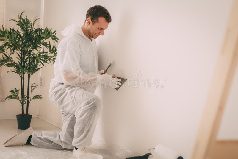 Polishing Wall stock photo. Image of spatula, renovation - 110860404