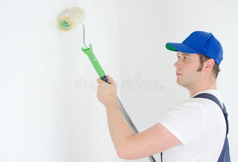 Professional Painter Worker is Painting One Wall Stock Image - Image of ...
