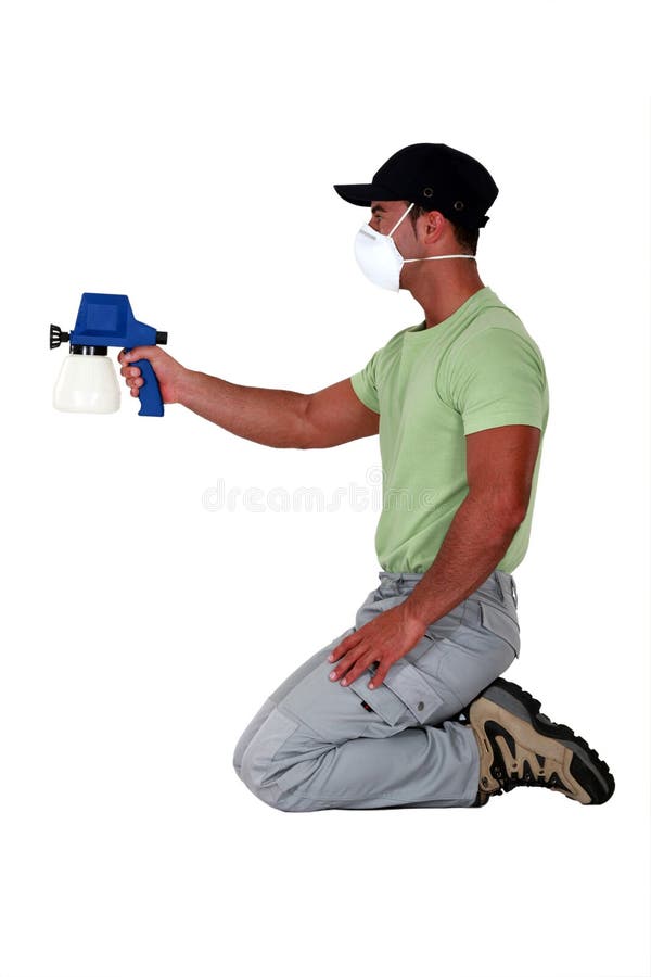 Painter using a spray gun. stock image. Image of construction - 33672243