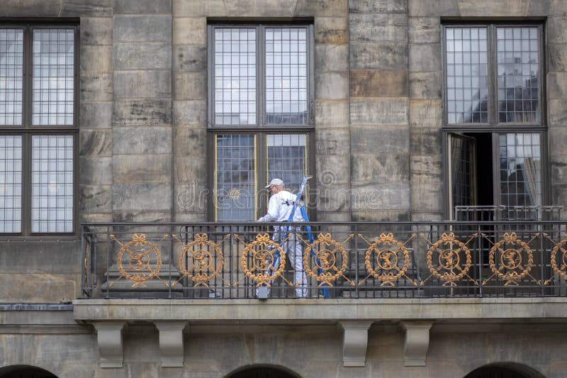 Painter at Work at the Palace on the Dam at Amsterdam the Netherlands ...