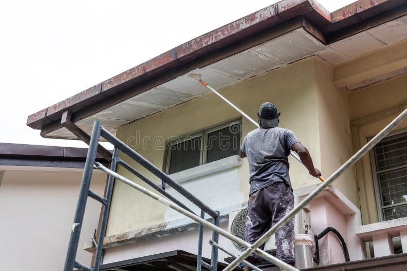 Painter Worker Adding Undercoat Foundation Paint Onto Ceiling with ...