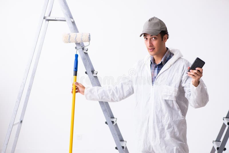 Painter Working at Construction Site Stock Photo - Image of ...