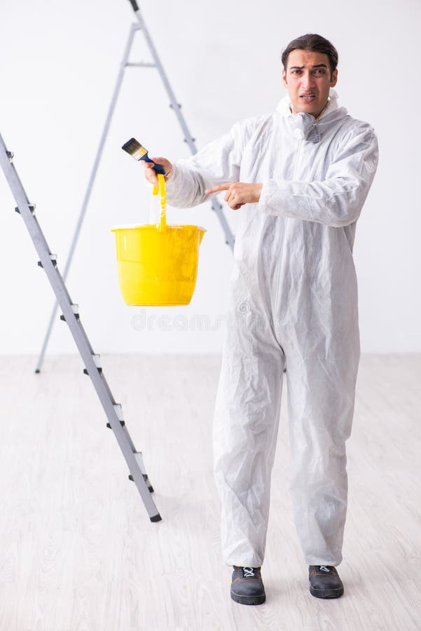 Painter Working at Construction Site Stock Image - Image of holding ...