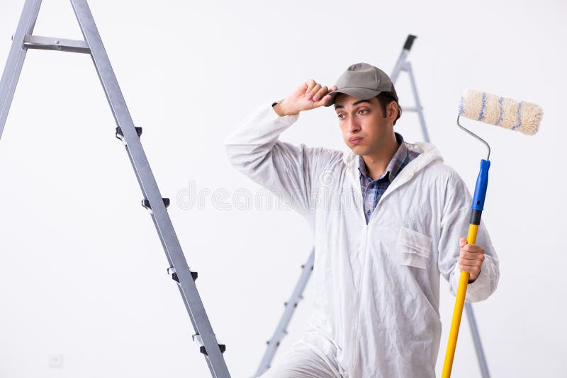 Painter Working at Construction Site Stock Photo - Image of decorating ...