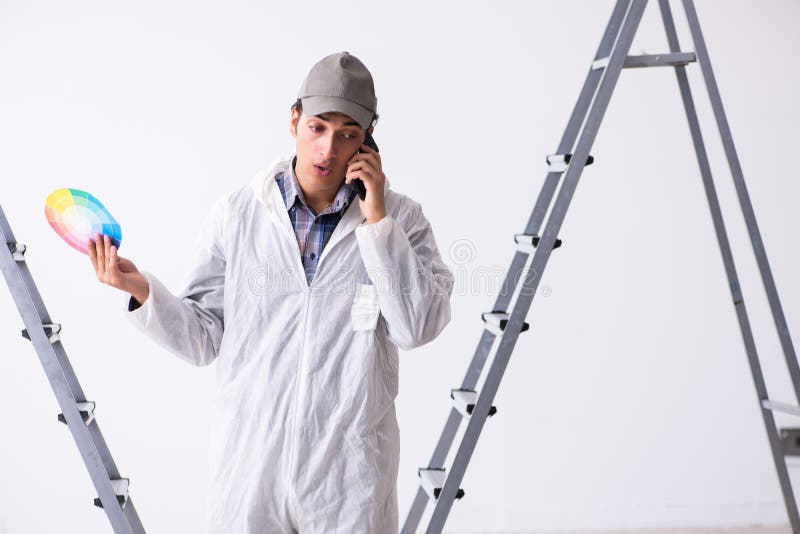 Painter Working at Construction Site Stock Image - Image of painting ...