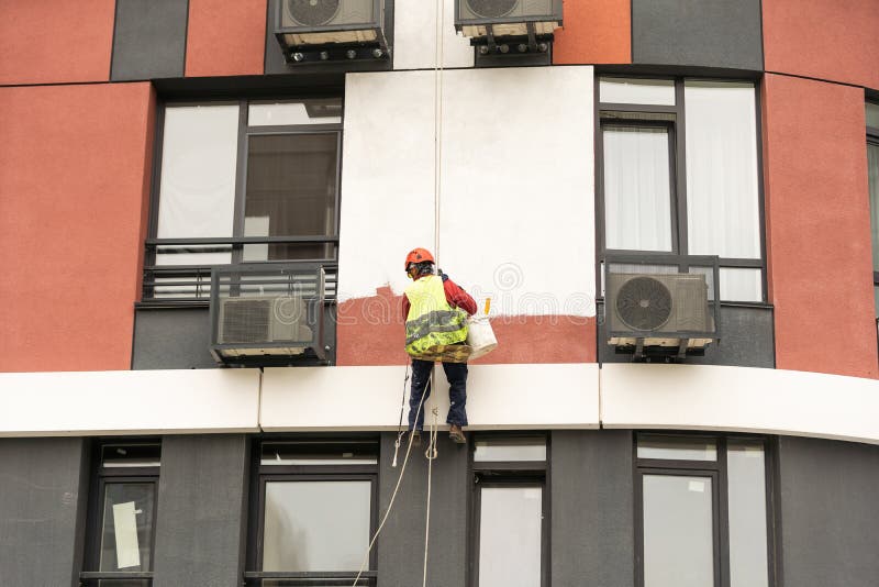 Painters-altitude Upgrade the Facade of the Building. Stock Image ...