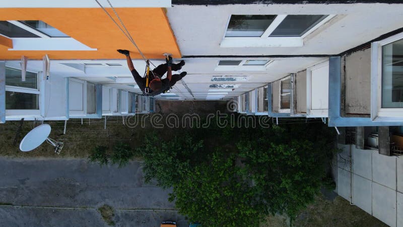 Painting and Decorating Buildings. Worker on a Construction Site of a ...