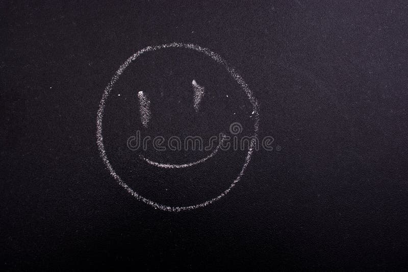 Painting of a Happy Face with Chalk on a Blackboard - Concept ...