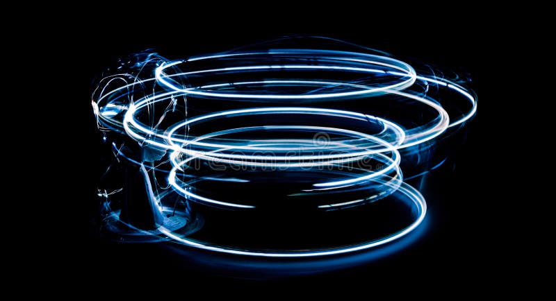 Painting LED Light in the Dark with Long Exposure Shot Stock Photo ...