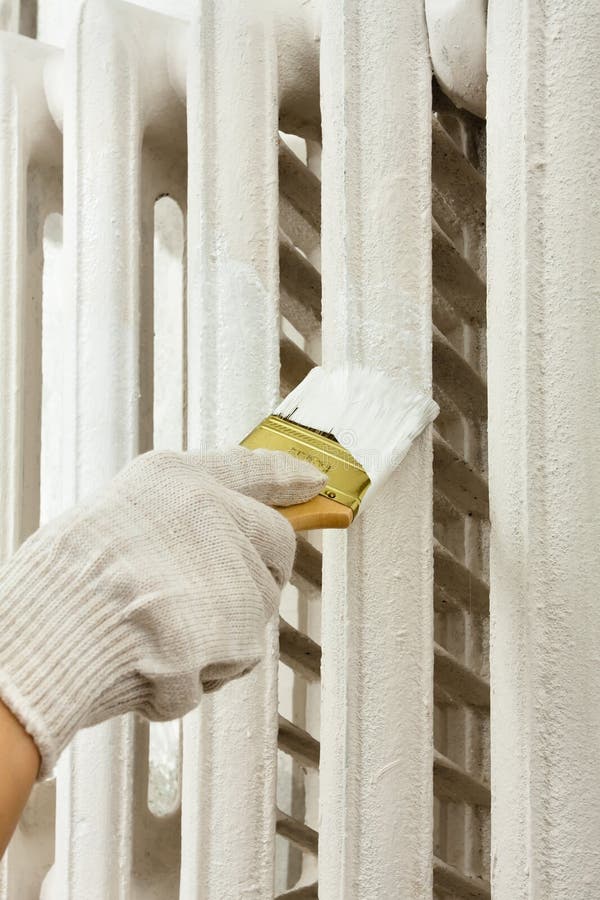 Painting Radiator Central Heating with Brush Stock Photo - Image of ...