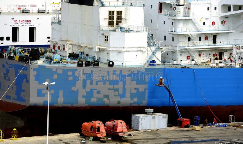 Painting the ship editorial image. Image of working, picker - 64835255