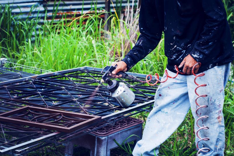 Painting the steel frame. stock image. Image of metal - 94215285