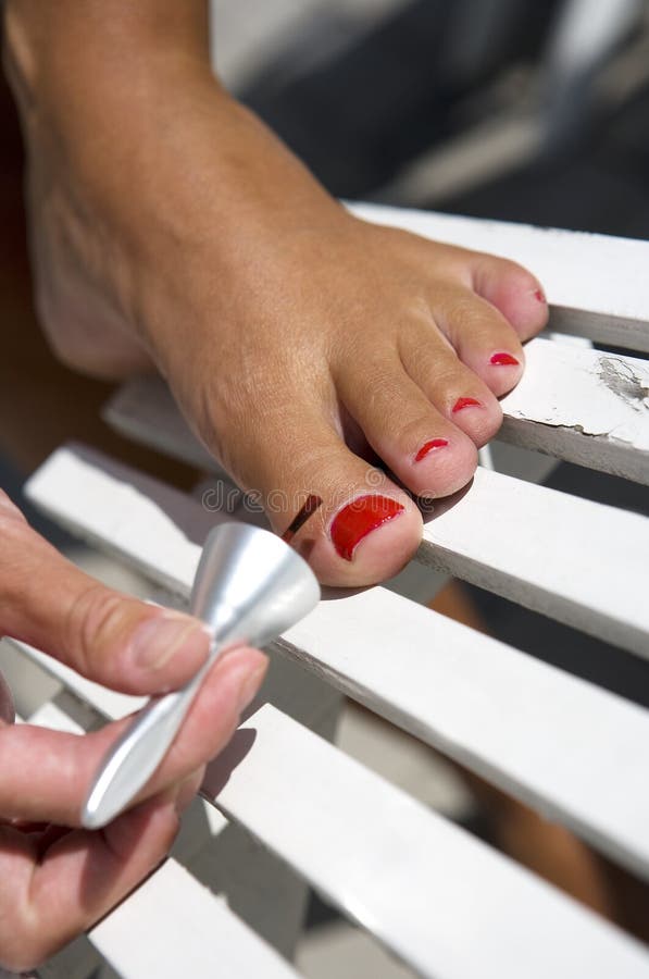 Painting toe nails stock image. Image of pedicure, vanity - 26765405