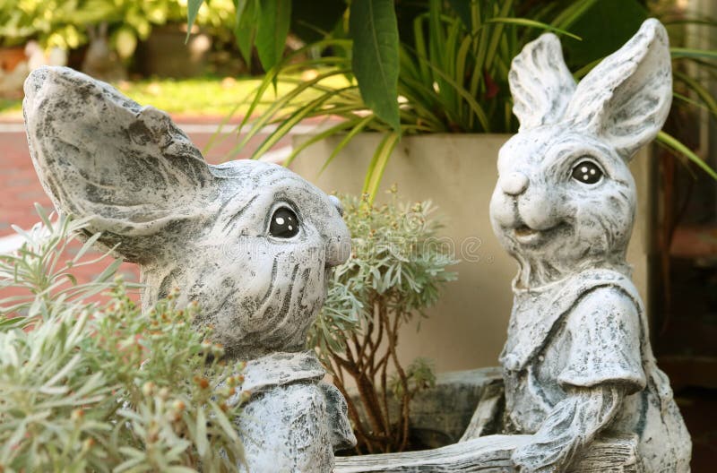 Pair of Easter Bunny Sculptures at the Yard Stock Image - Image of ...