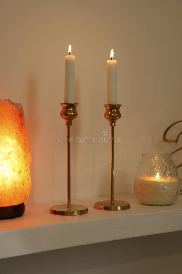 Pair of Beautiful Candlesticks, Scented Candle and Salt Lamp on White ...