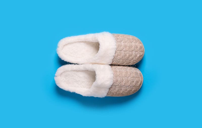 Pair of Beautiful Soft Slippers on Light Blue Background, Top View ...