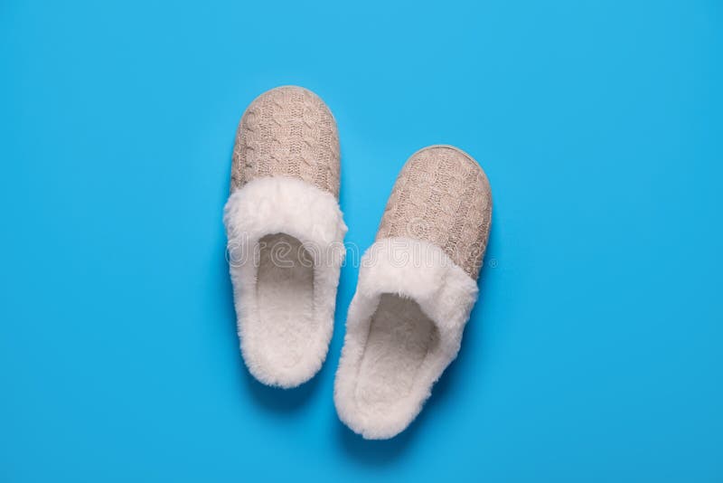 Pair of Beautiful Soft Slippers on Light Blue Background, Top View ...