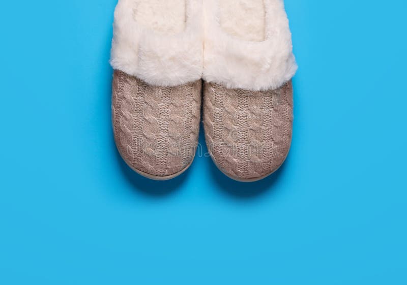 Pair of Beautiful Soft Slippers on Light Blue Background, Top View ...