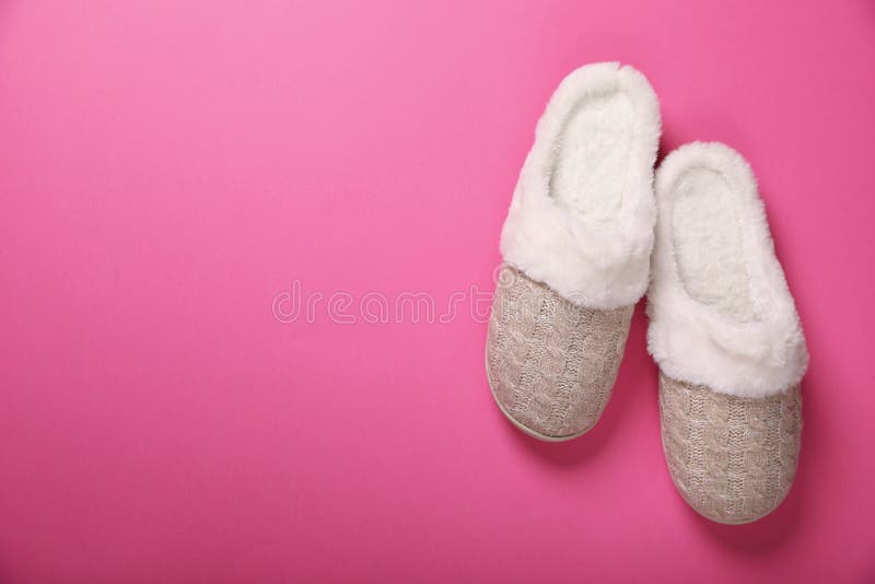 Pair of Beautiful Soft Slippers on Pink Background, Top View. Space for ...