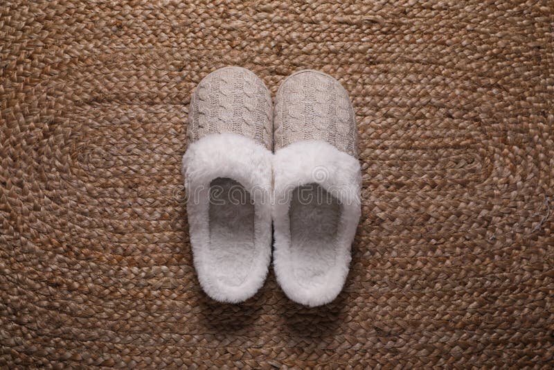 Pair of Beautiful Soft Slippers on Wicker Carpet, Top View Stock Image ...