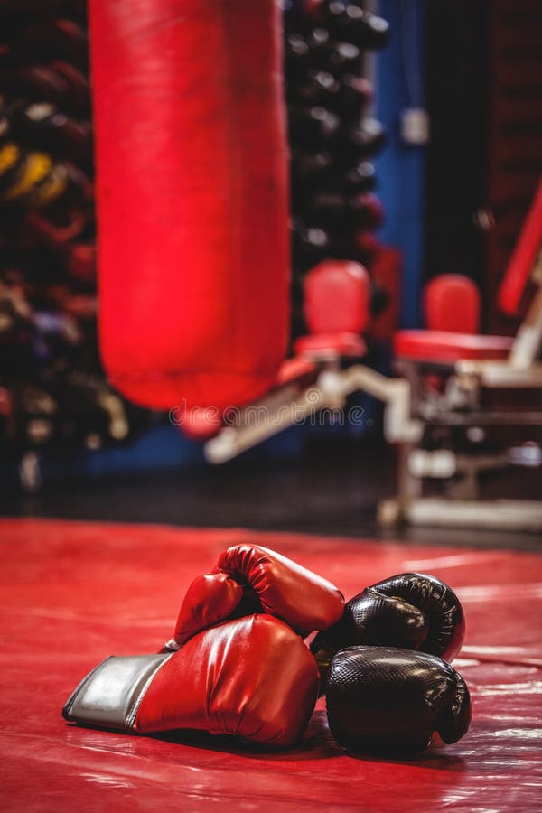 Pair of Black and Red Boxing Gloves Stock Photo - Image of adjusting ...