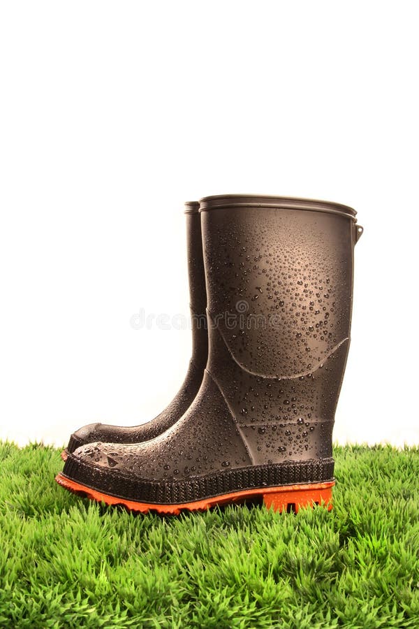 Pair of black rubber boots stock photo. Image of garden - 7838726