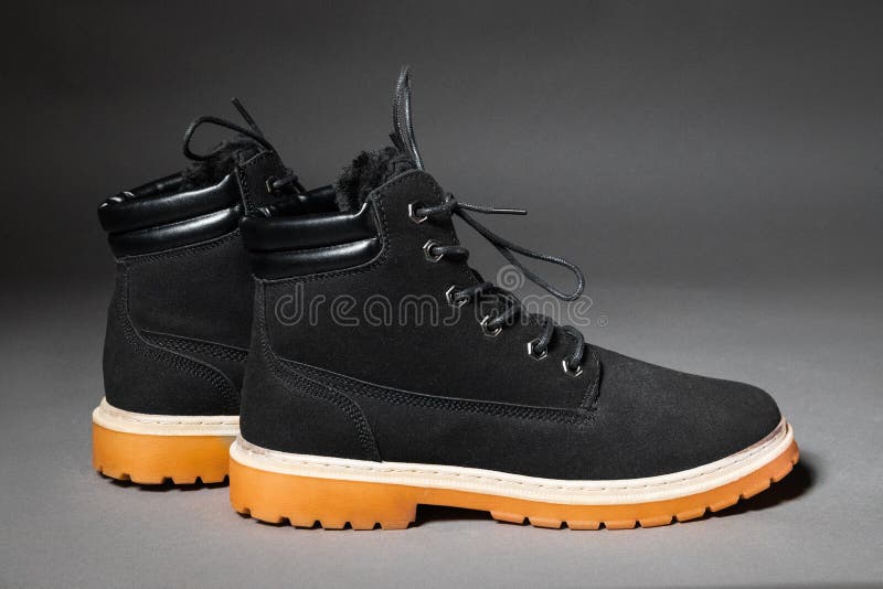 Pair of Black Winter Men S Boots on a Gray Background, Side View Stock ...