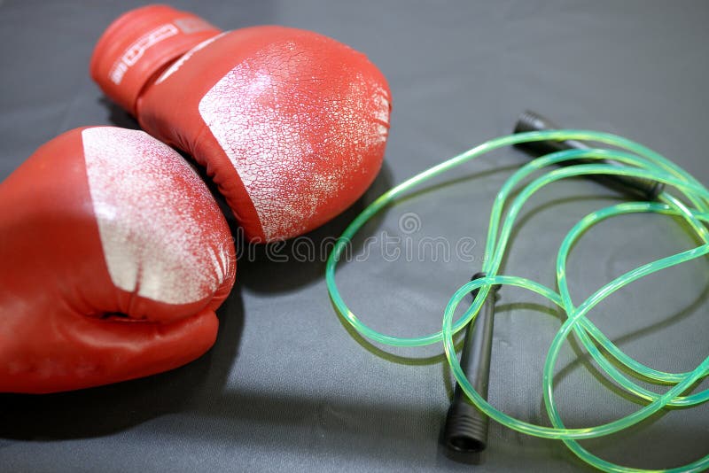 Pair of Boxing Red Gloves and Jump Rope Stock Photo - Image of combat ...