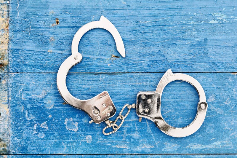 Chrome handcuffs stock photo. Image of justice, authority - 1446882