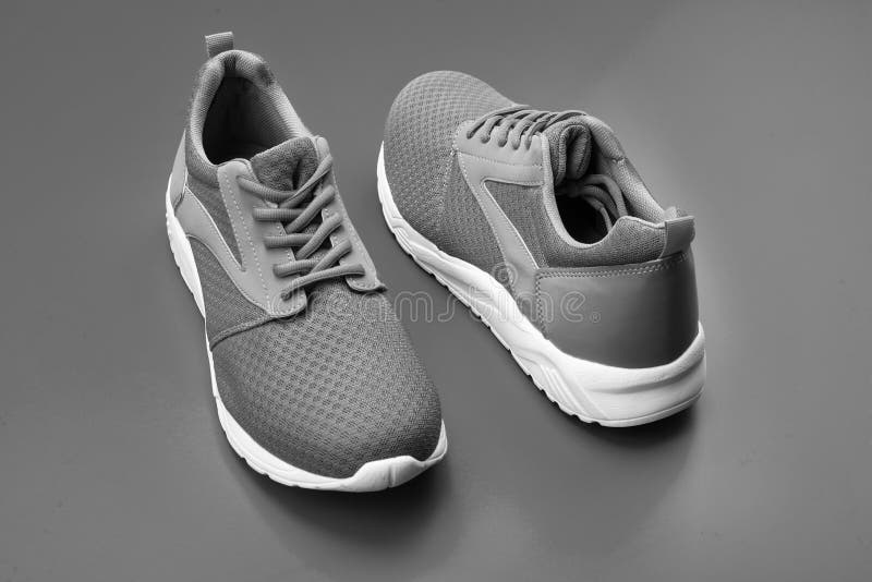 Pair of Comfortable Blue Sport Shoes on Blue Background, Shoe Store ...