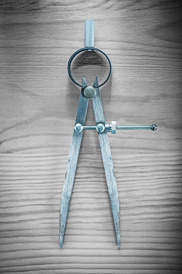 Pair of Compasses on Wooden Board Construction Concept Stock Image ...