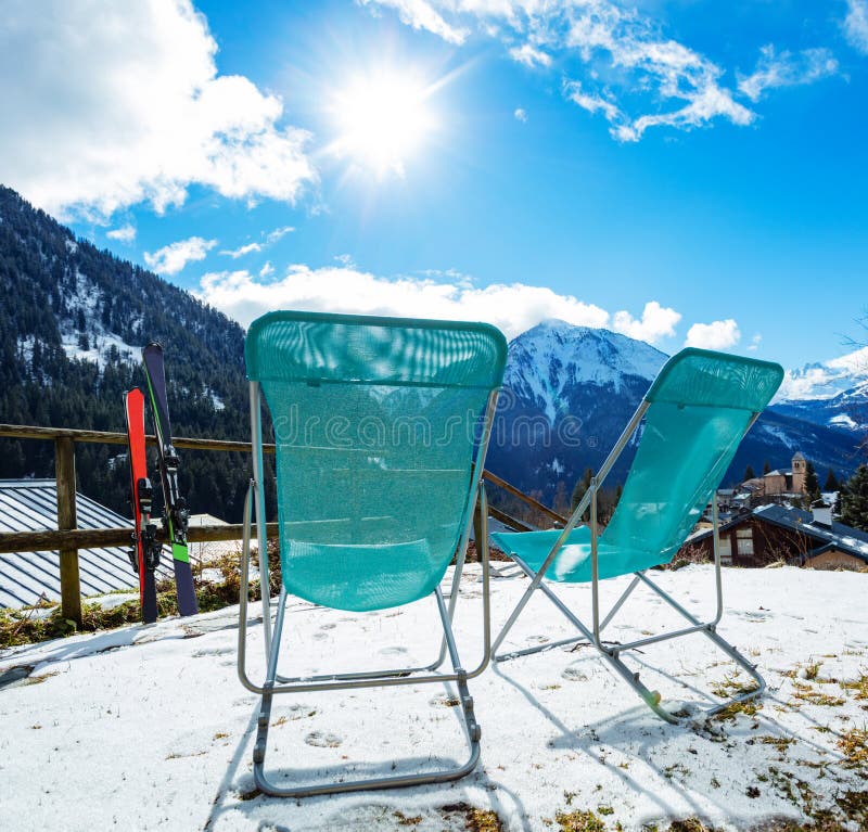 Pair of Deck Chairs and Ski Over Mountains View Stock Image - Image of ...