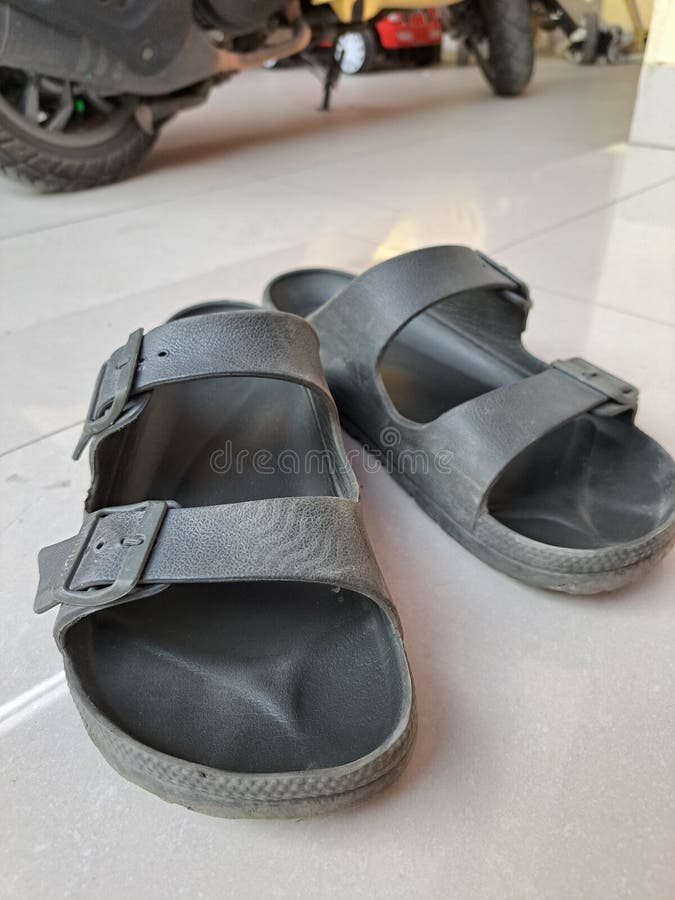 A Pair of Dirty Sandals on the Floor Stock Photo - Image of sandals ...